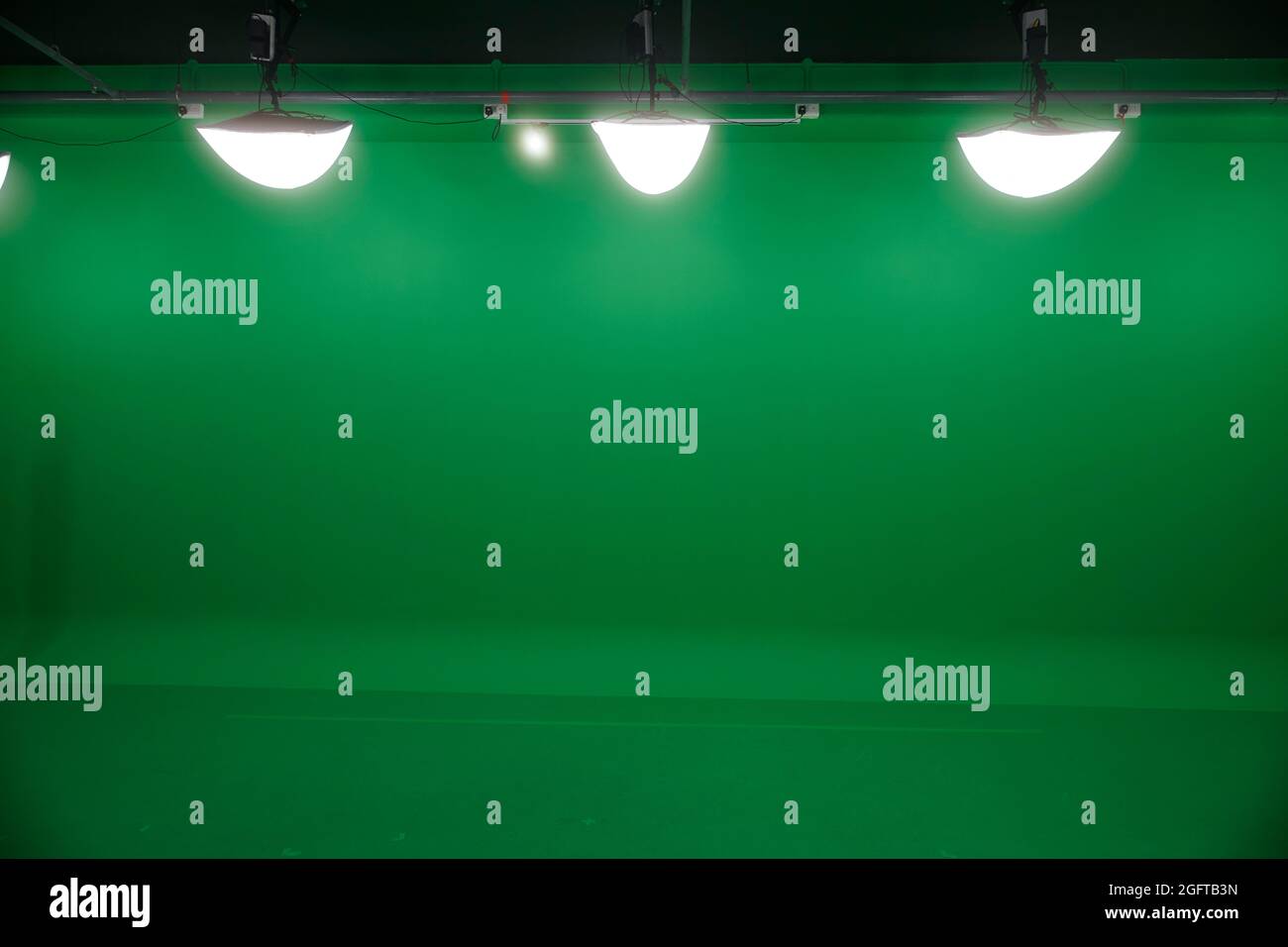 Green screen studio interview set-up with lighting Stock Photo - Alamy
