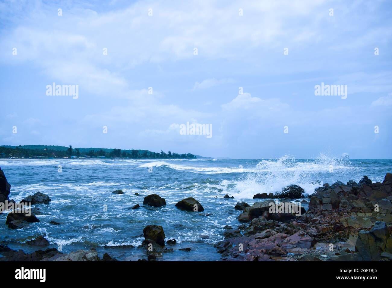 Ocean-Sea Waves, Rock stones and Sky Blue Landscape Background Stock ...