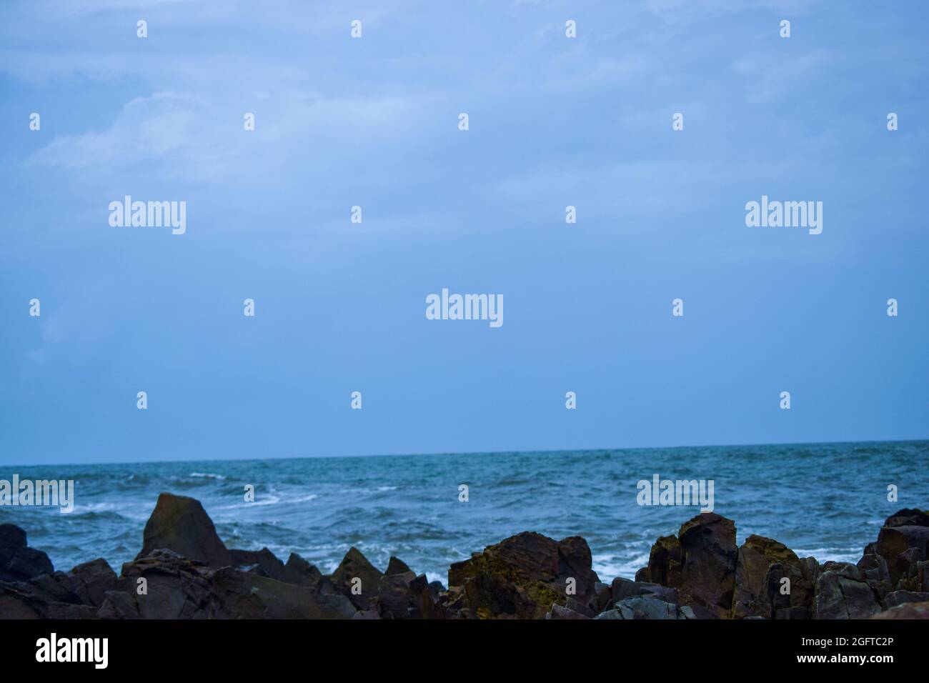 Ocean-Sea Waves, Rock stones and Sky Blue Landscape Background Stock ...
