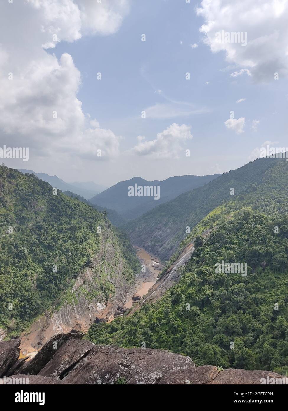 Vertical shot of the landscape at the Duduma waterfalls in Badigada ...