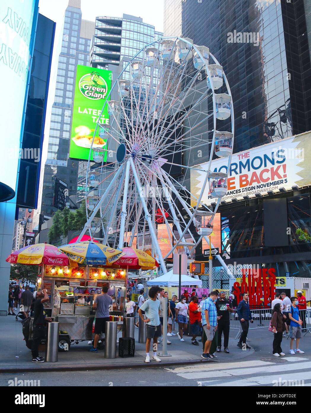A limited-time Ferris Wheel opens in Times Square offering tourists and ...