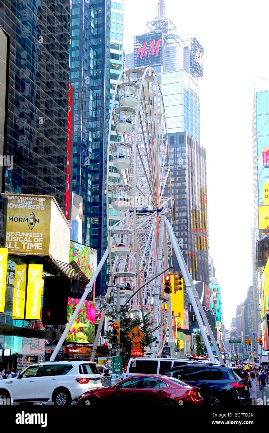A limited-time Ferris Wheel opens in Times Square offering tourists and ...