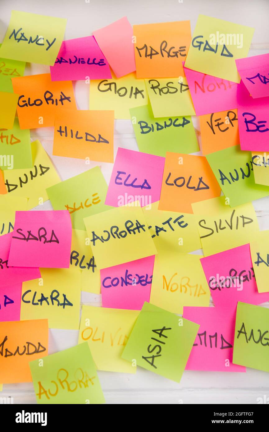 Women's names written on post it in different colors Stock Photo - Alamy