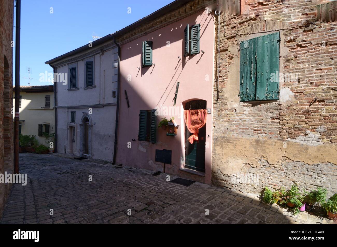 typical narrow street of the medieval town Stock Photo - Alamy