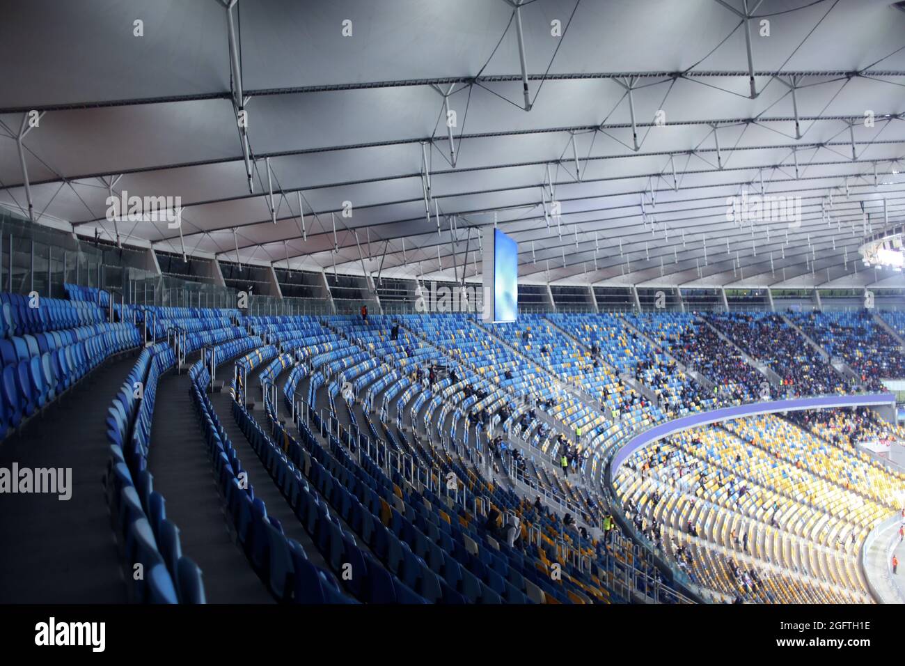 Stadium seats with fans Stock Photo - Alamy