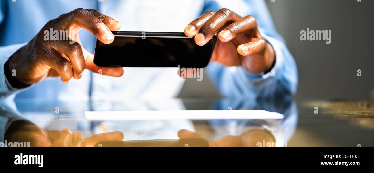 Remote Cheque Deposit Using Mobile Phone. Check Capture Stock Photo - Alamy
