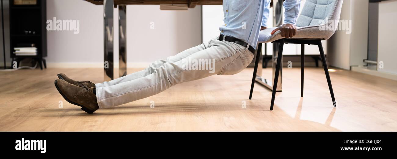 Triceps Dip Exercise Workout Using Office Chair Stock Photo - Alamy