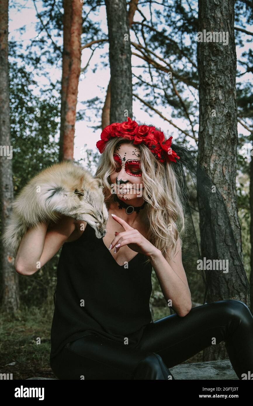 Happy Halloween concept. Scared horrible female sitting in special ...