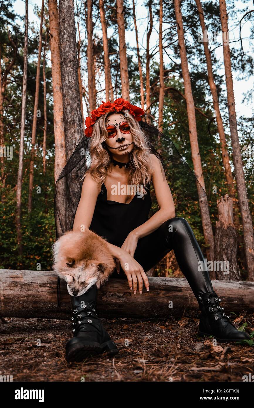 Happy Halloween concept. Scared horrible female sitting in special ...