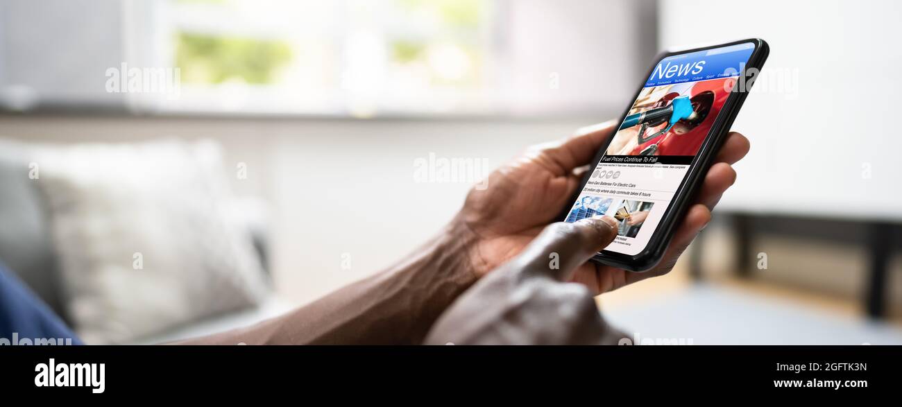 Mobile newspaper hi-res stock photography and images - Alamy