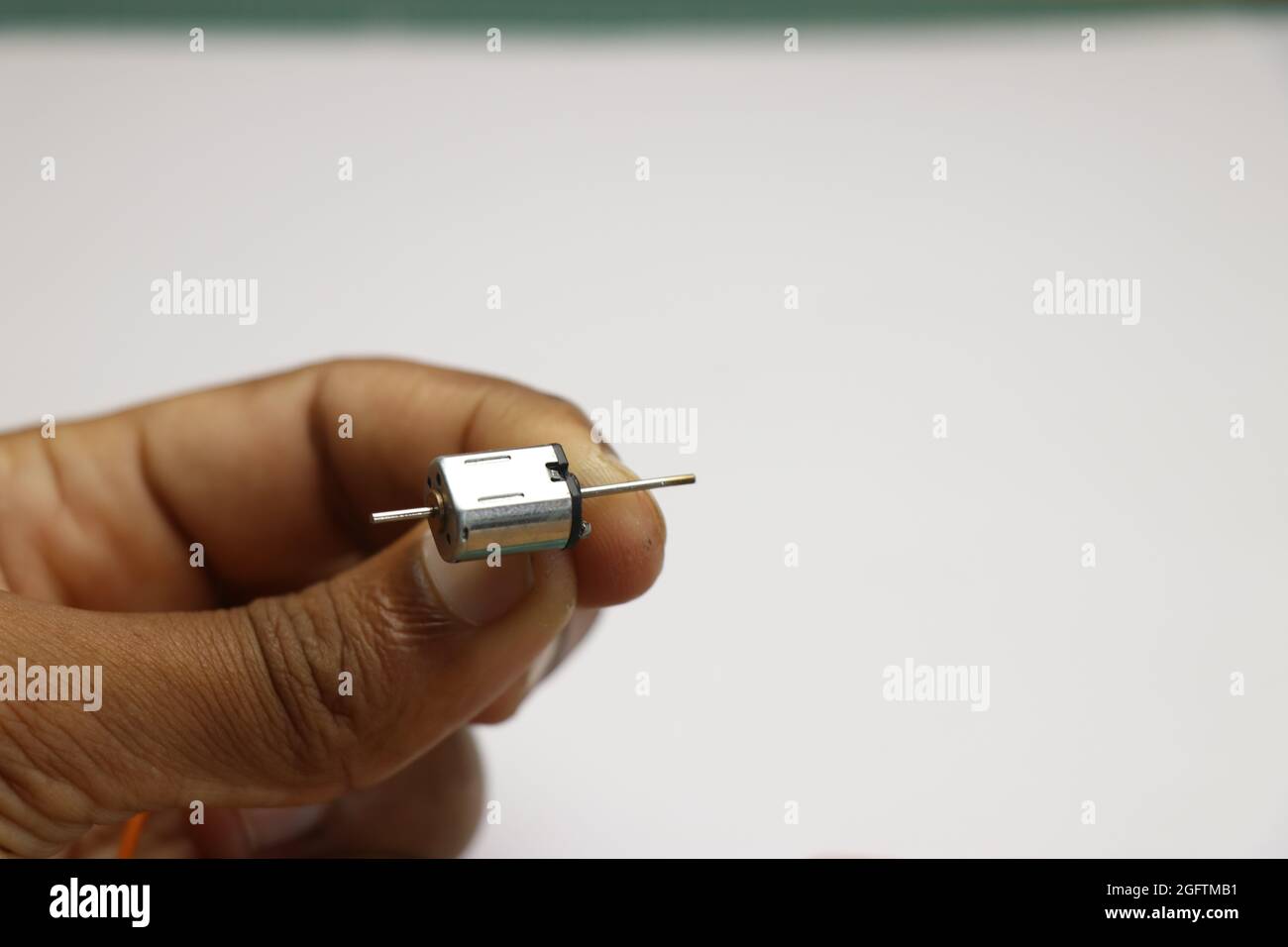 Double shaft dc motor which is very small. DC motors are used to run ...
