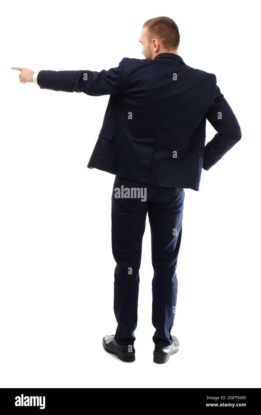 Young business coach standing on white background Stock Photo - Alamy