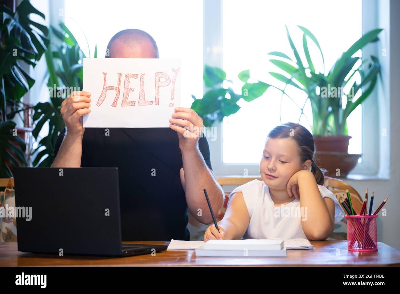 Frustrated father teaching kid at home, home school education. COVID-19 ...