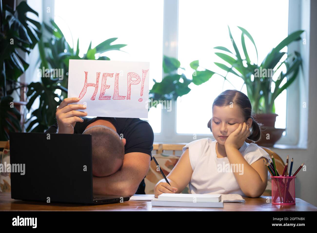 Frustrated father teaching kid at home, home school education. COVID-19 ...