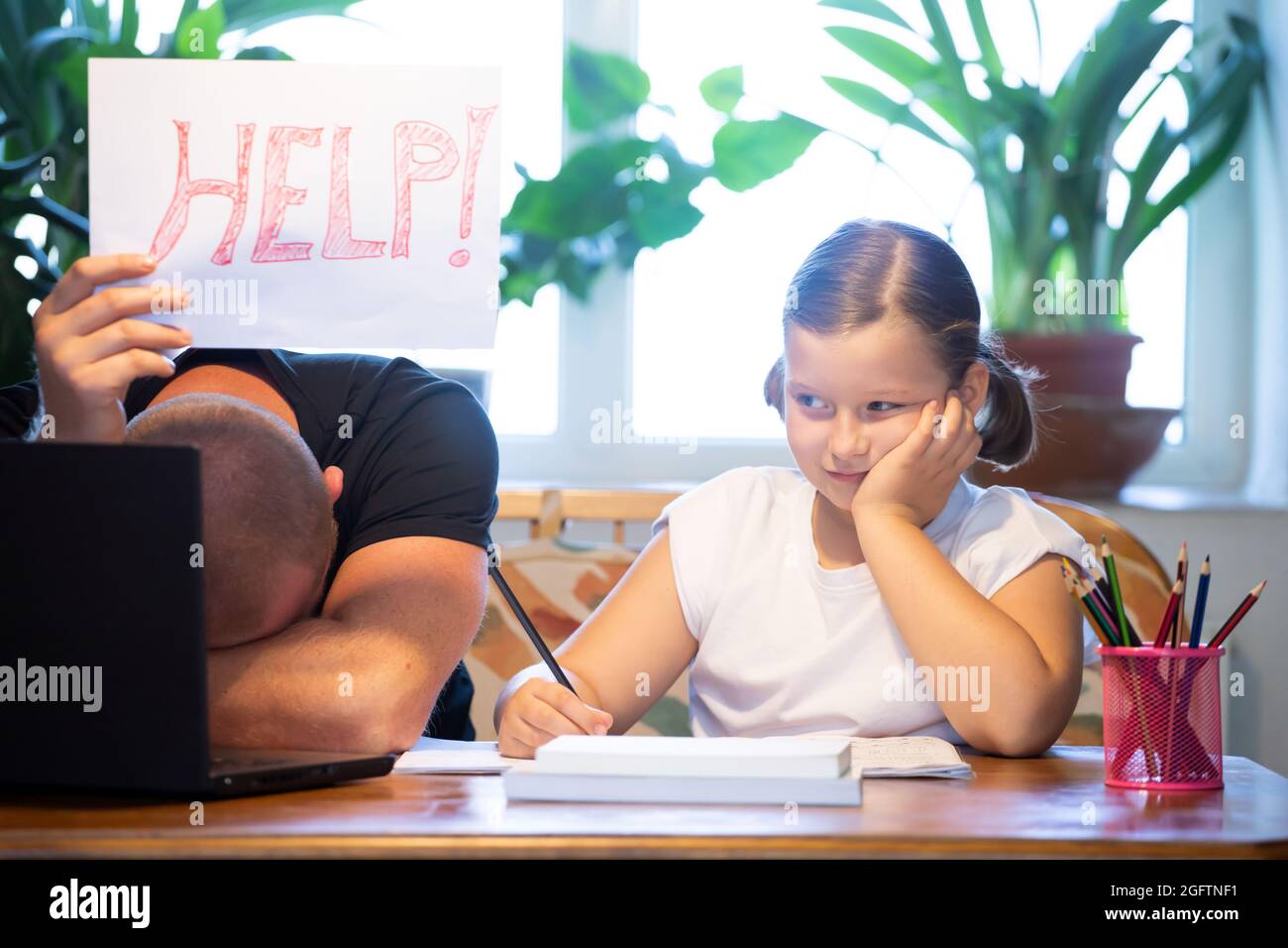 Frustrated father teaching kid at home, home school education. COVID-19 ...