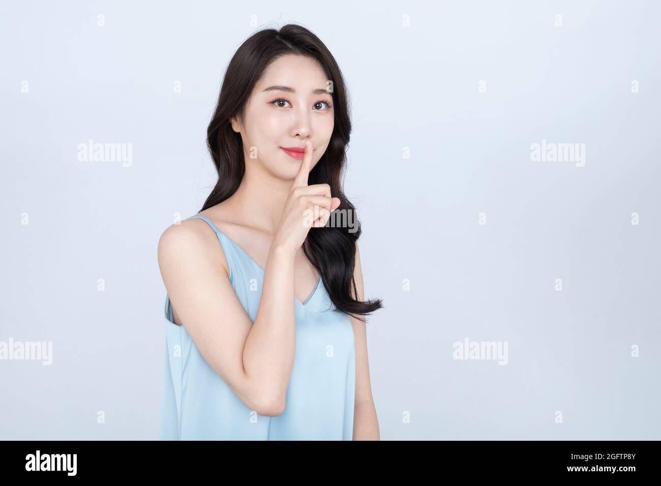 beautiful Korean Asian young woman model with hand motion, skin beauty ...