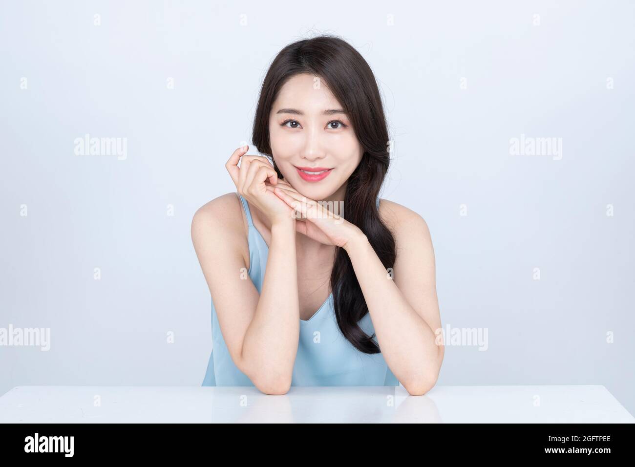 beautiful Korean Asian young woman model with hand motion, skin beauty ...