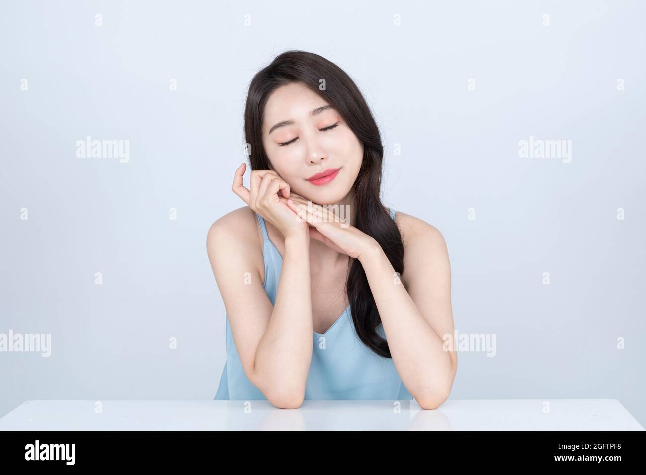 beautiful Korean Asian young woman model with hand motion, skin beauty ...