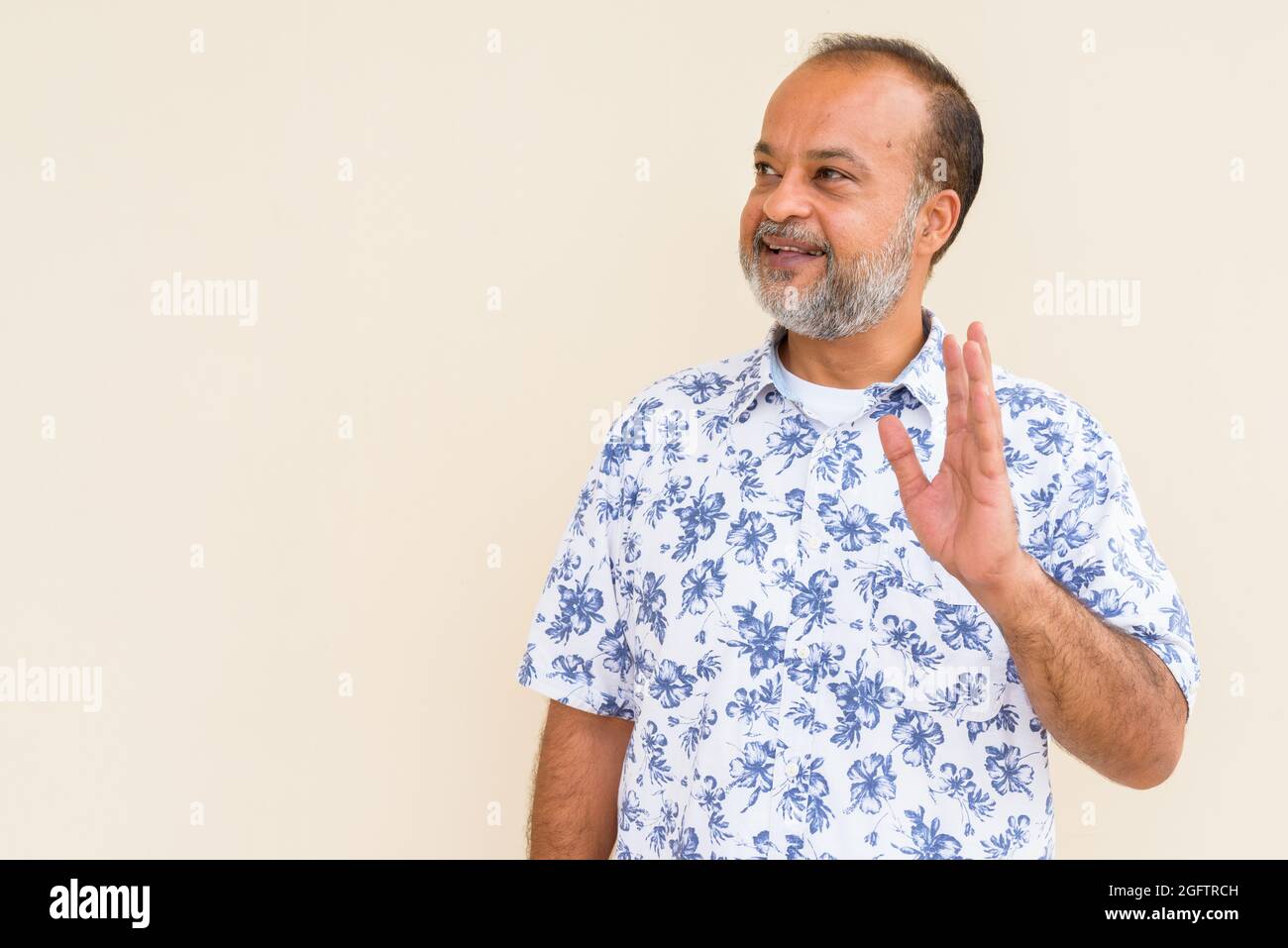 Indian man waving hi-res stock photography and images - Alamy