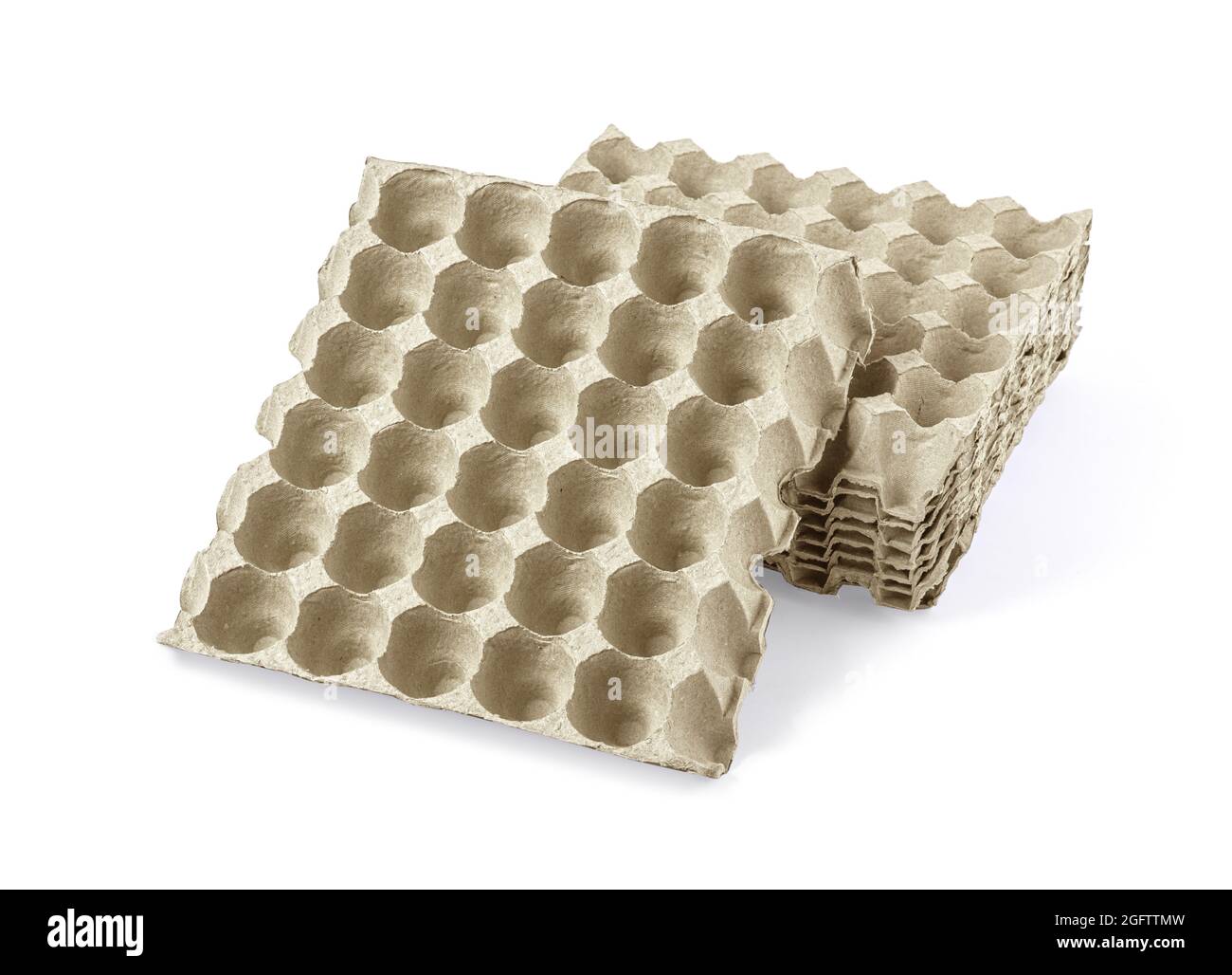 Stack cardboard packaging for eggs isolated on white with clipping path ...