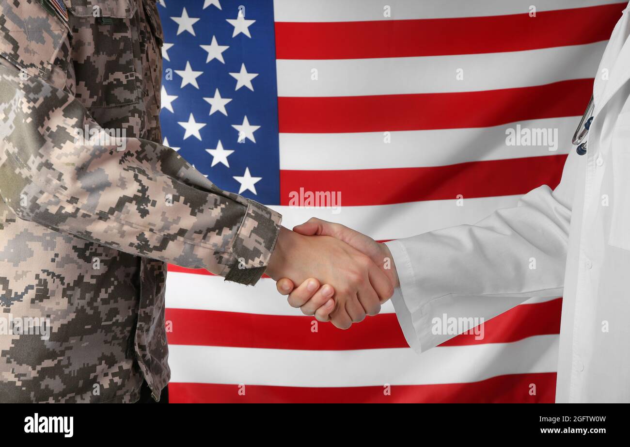 Female veteran handshake hi-res stock photography and images - Alamy