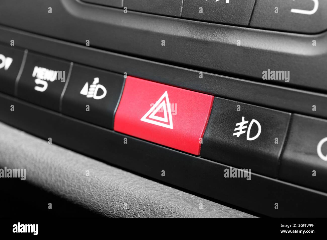 Emergency warning button on car console, closeup Stock Photo - Alamy