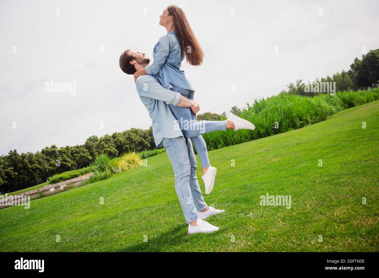 Full size profile side good mood smiling couple dancing husband hold ...