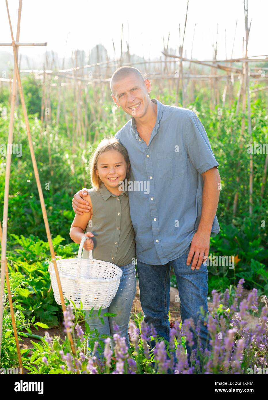 Father helping children garden hi-res stock photography and images - Alamy