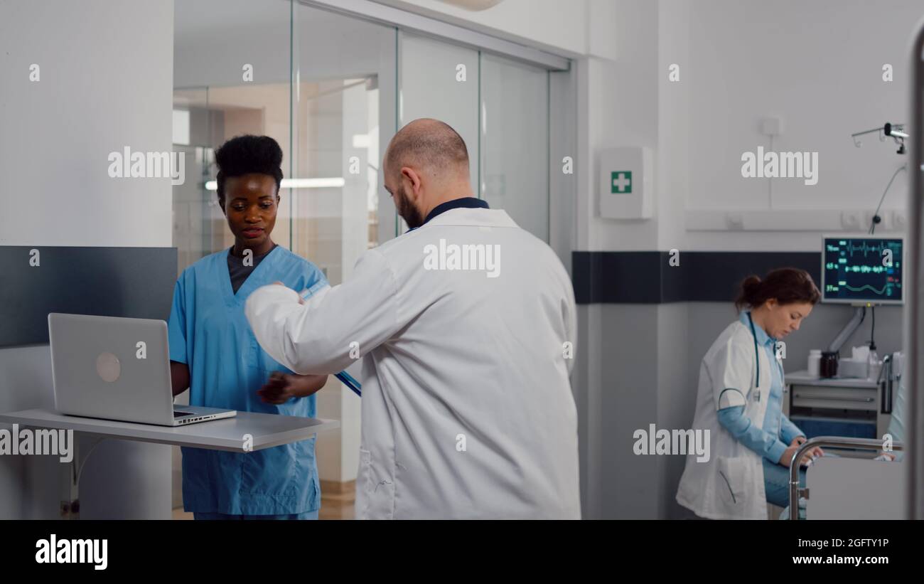 Hospital patient bed laptop typing hi-res stock photography and images ...