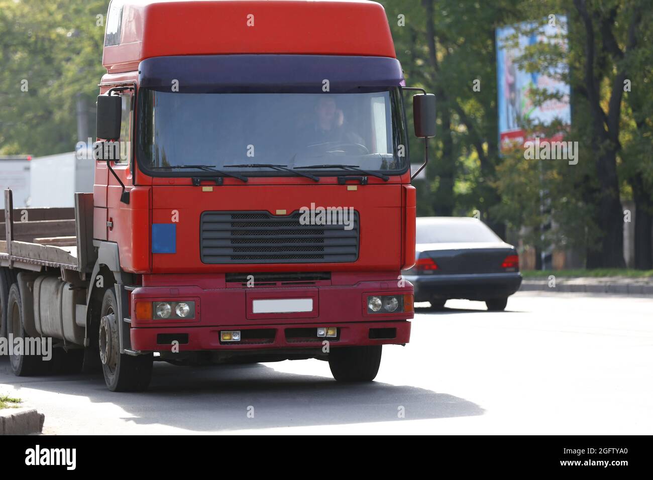Front of red American cargo truck Stock Photo - Alamy