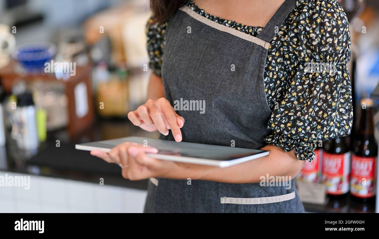 Restaurant waitress order device hi-res stock photography and images ...