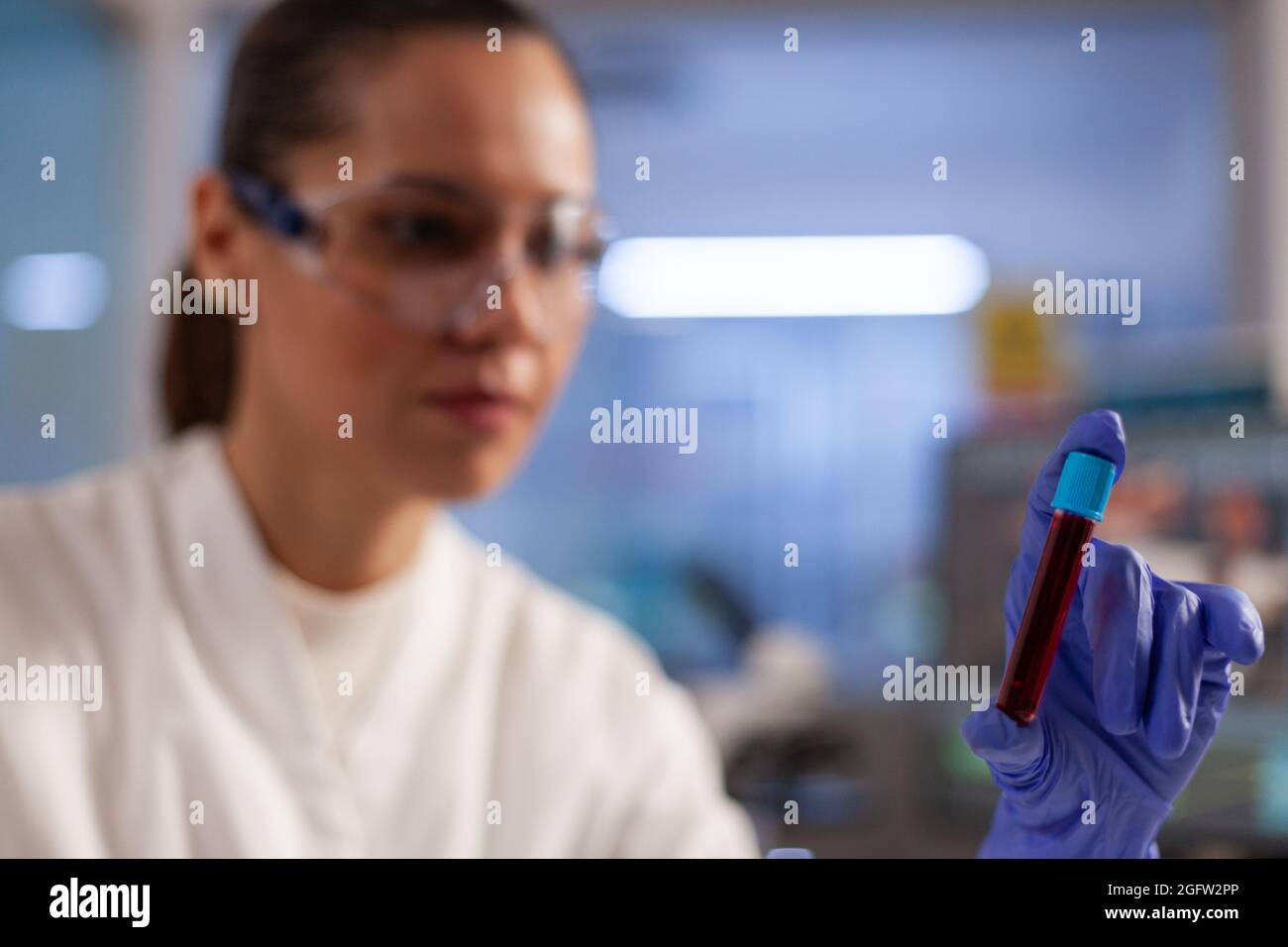 Doctor tests blood tube hi-res stock photography and images - Alamy