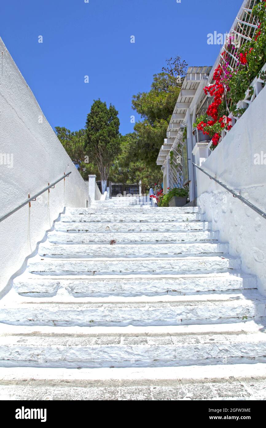 Stone steps leading up a hill to the village of Pyrgos in Santorini ...
