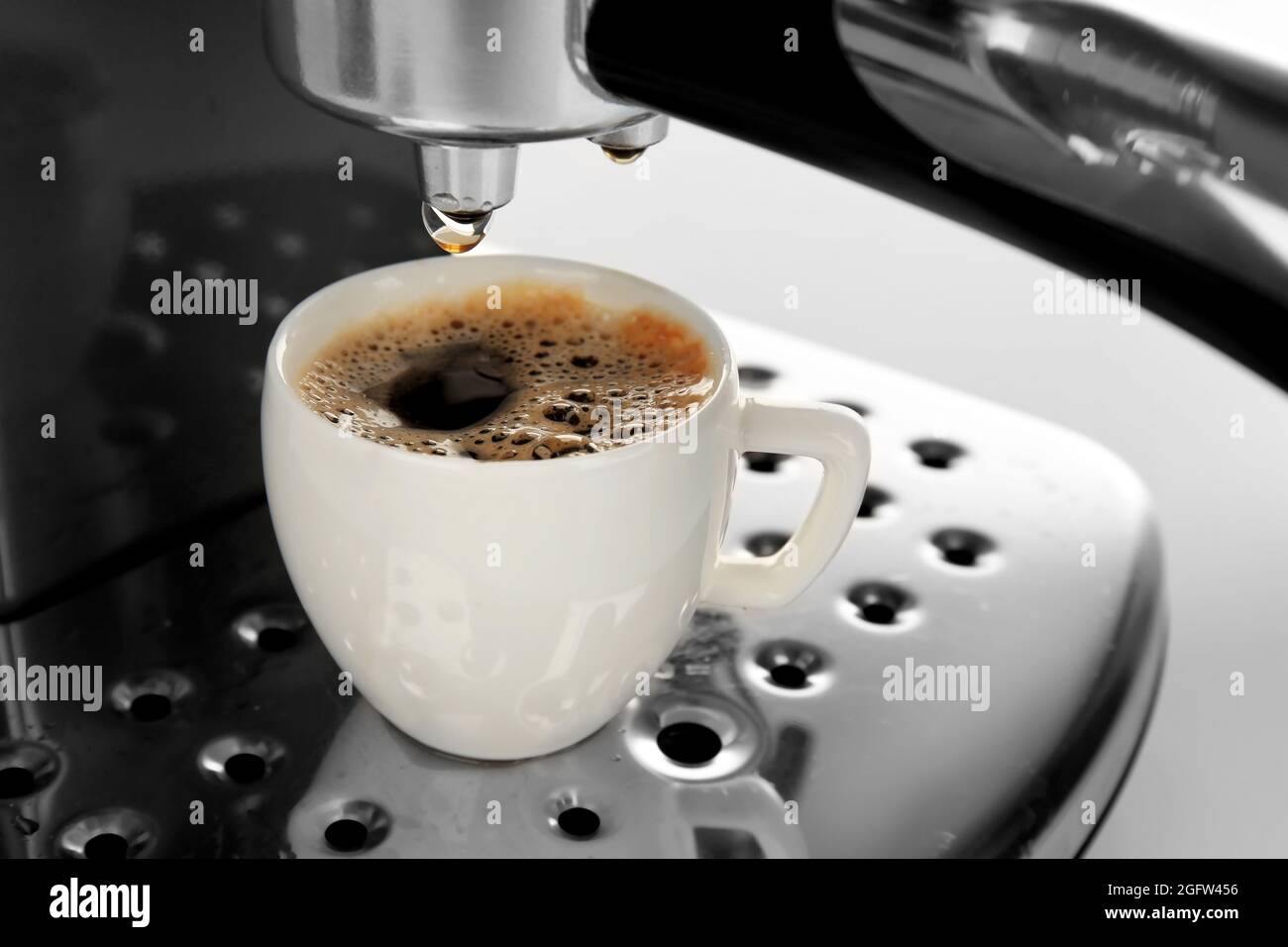 Coffee machine making espresso, closeup Stock Photo - Alamy