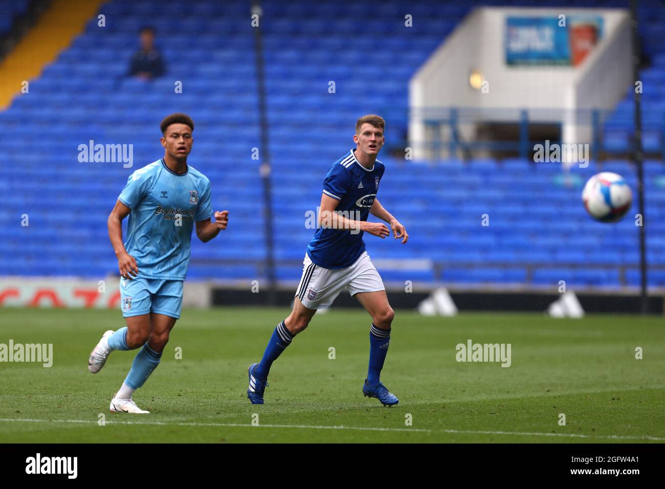 Bailey Clements of Ipswich Town and Blaine Rowe of Coventry City ...