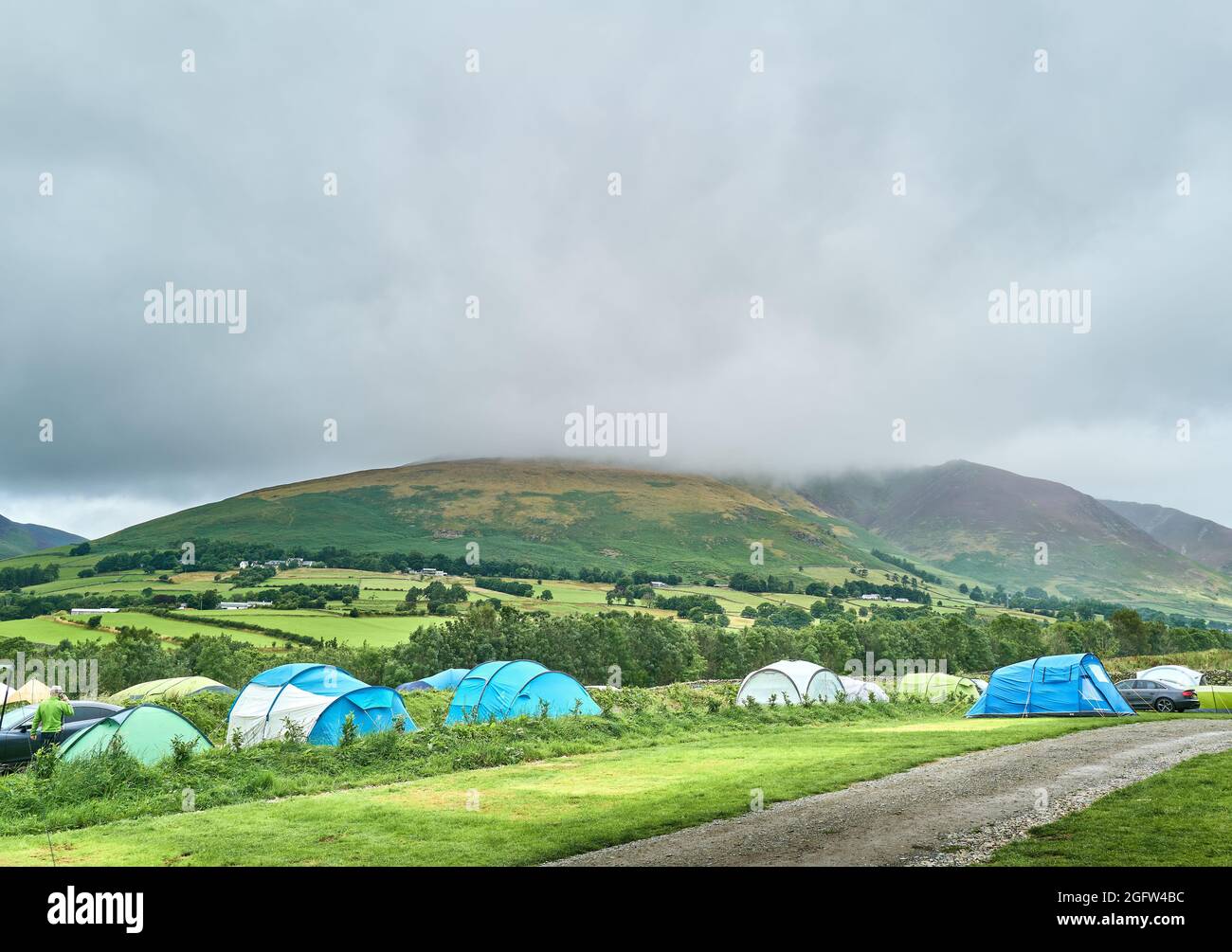 Tent camping on a farm field in the Lake District opposite the ...