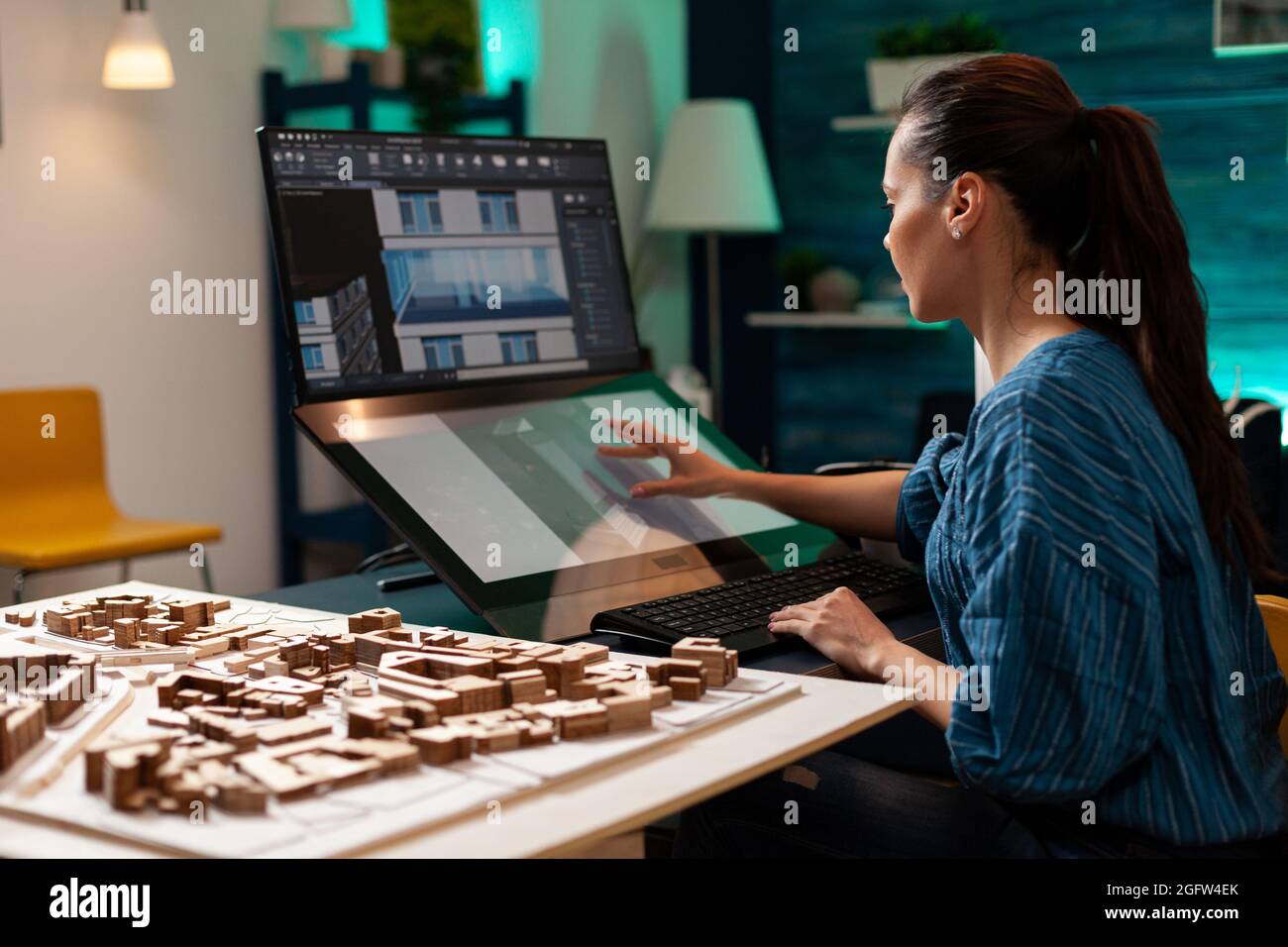 Architectural sketch designer making digital building plan for ...