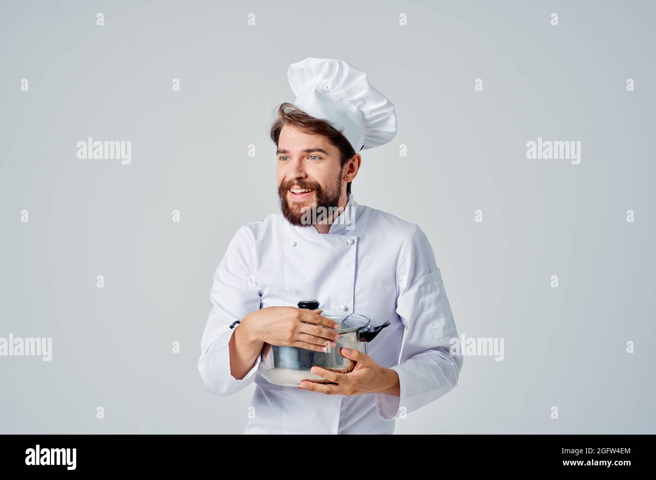 man chef with a saucepan in his hands emotions cooking food work Stock ...