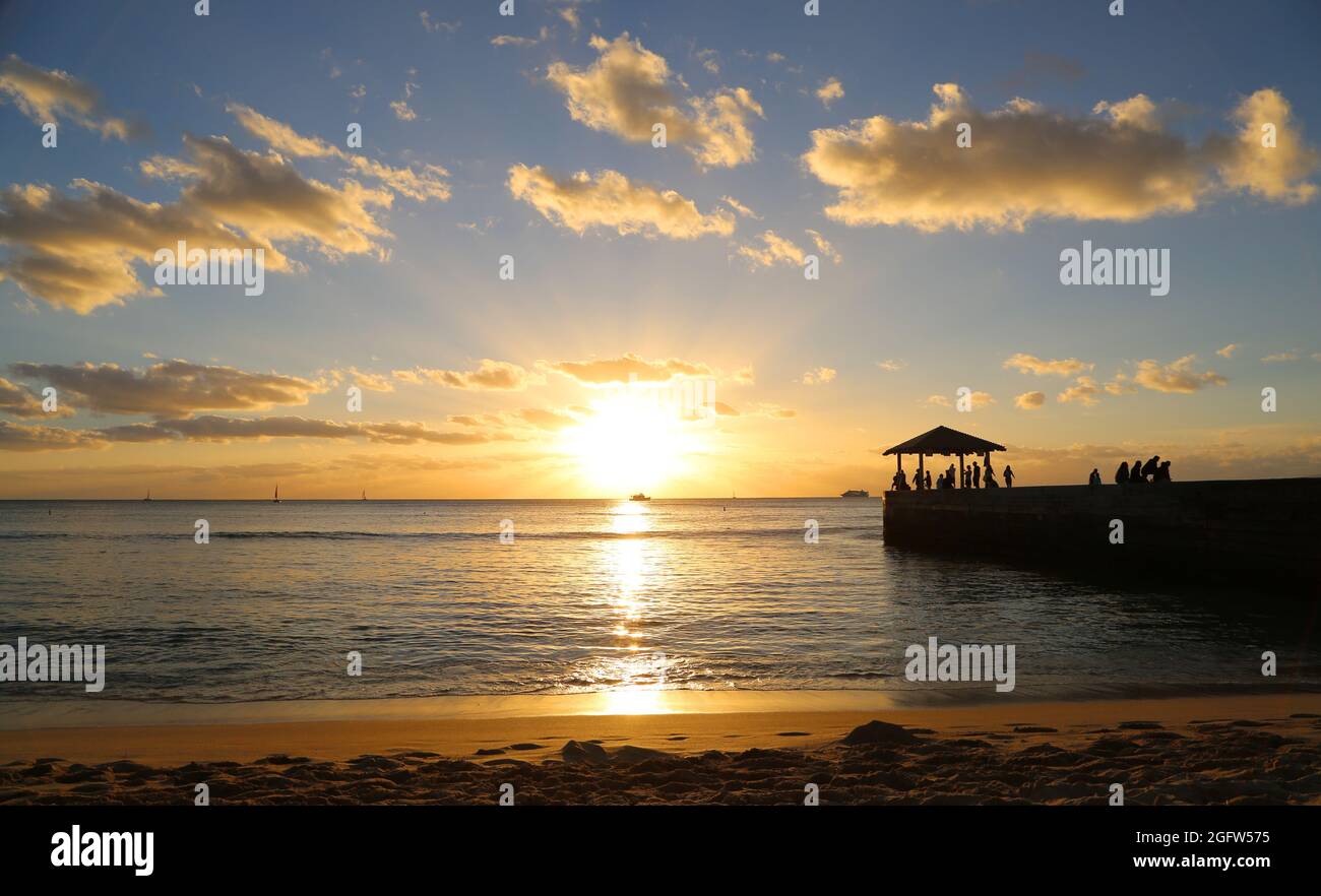 Sunset on Waikiki Beach - Oahu, Hawaii Stock Photo - Alamy