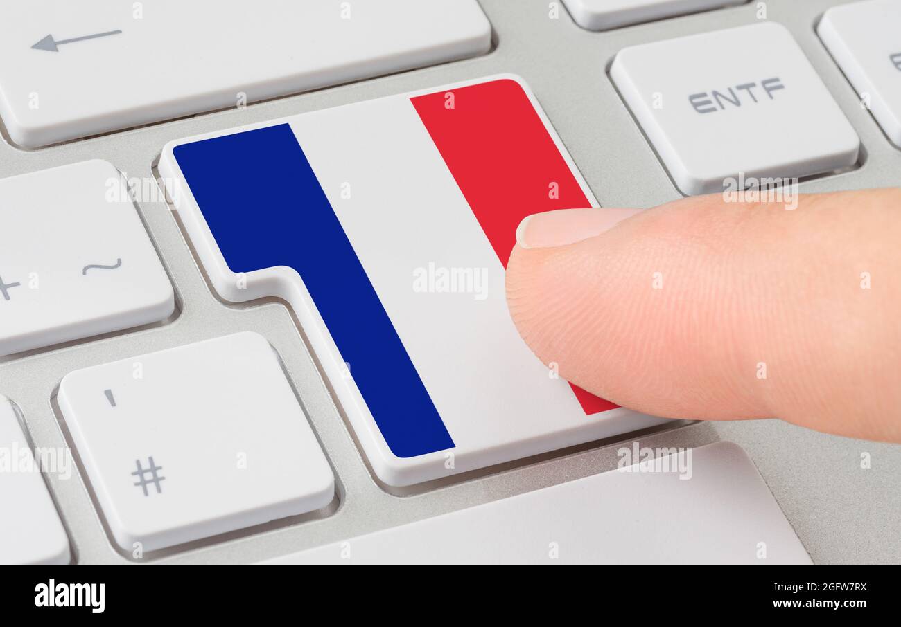 A keyboard with a labeled button - Flag of France Stock Photo - Alamy