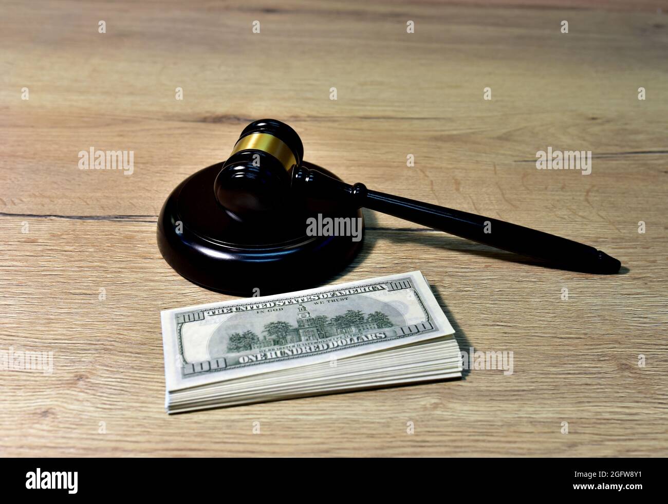Judge hammer and bundles of dollars. Justice in courtroom. Mallet of ...