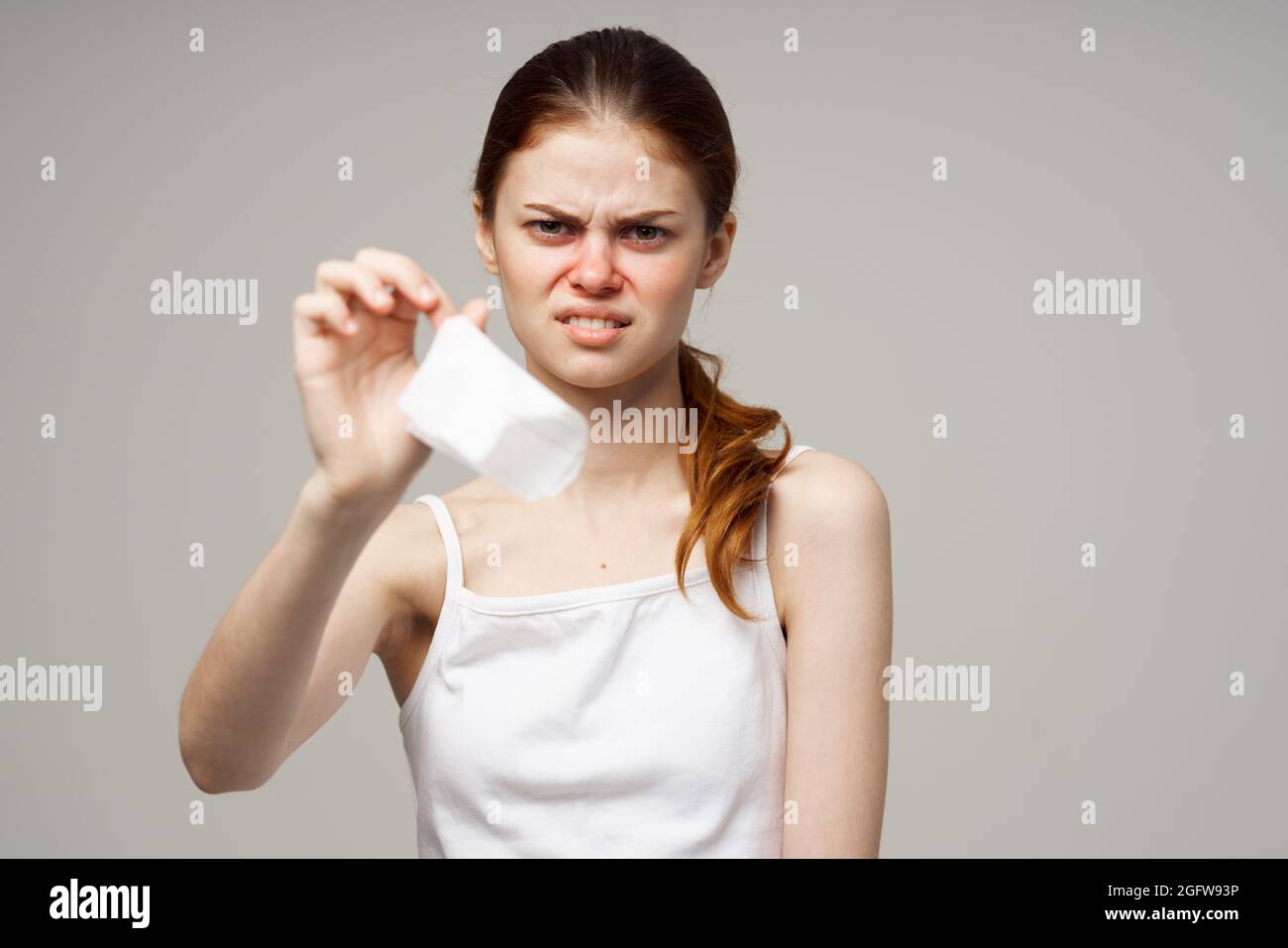 woman in white t-shirt with a scarf close-up Stock Photo - Alamy