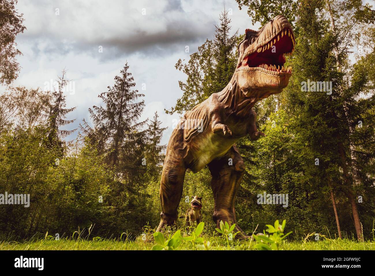 Big model of prehistoric dinosaur Tyrannosaurus rex in the nature ...