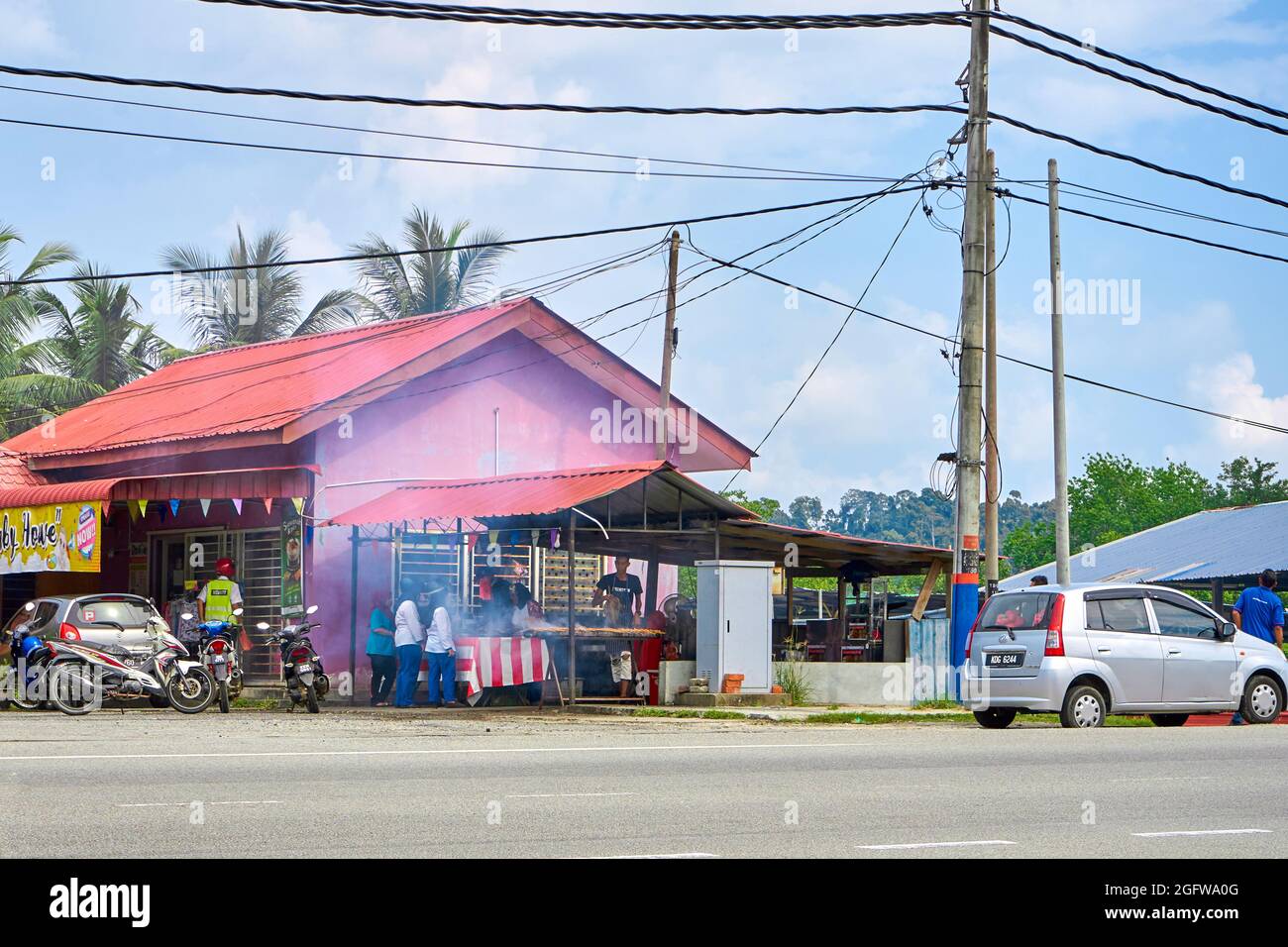 Stunning street view, in the city of Kuang on a tropical island in ...