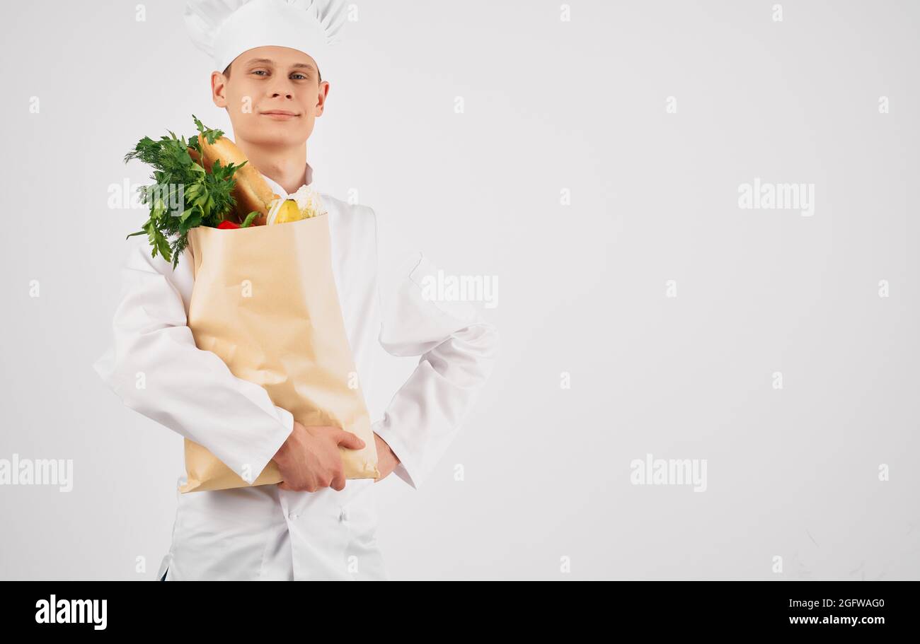 chef with food bag cooking work service Stock Photo - Alamy