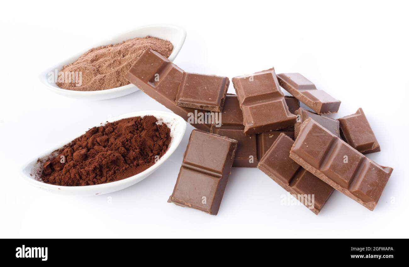 Chocolate squares and cocoa powder, isolated on white Stock Photo - Alamy