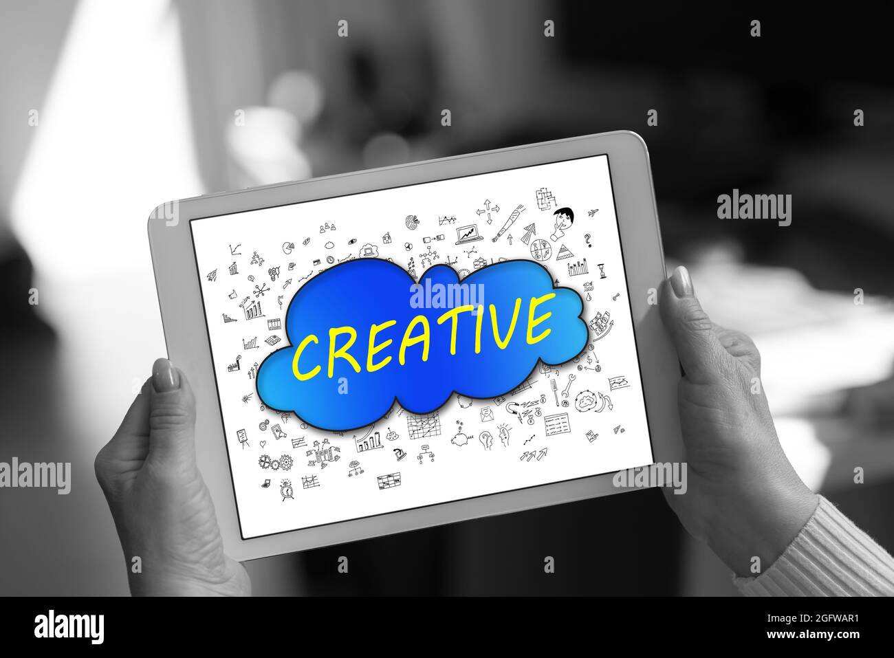 Creativity concept shown on a tablet held by a woman Stock Photo - Alamy
