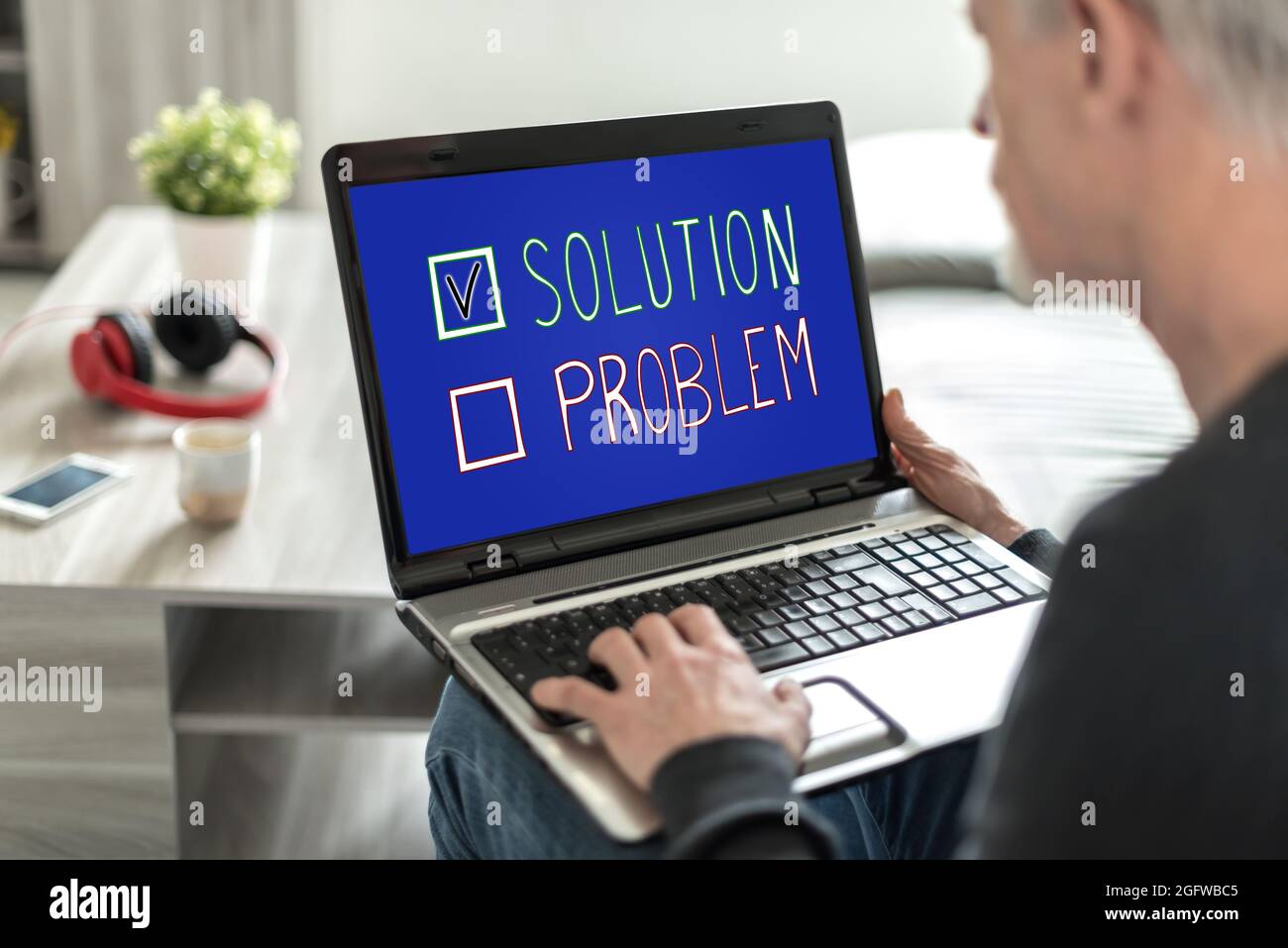 Laptop screen displaying a solution concept Stock Photo - Alamy