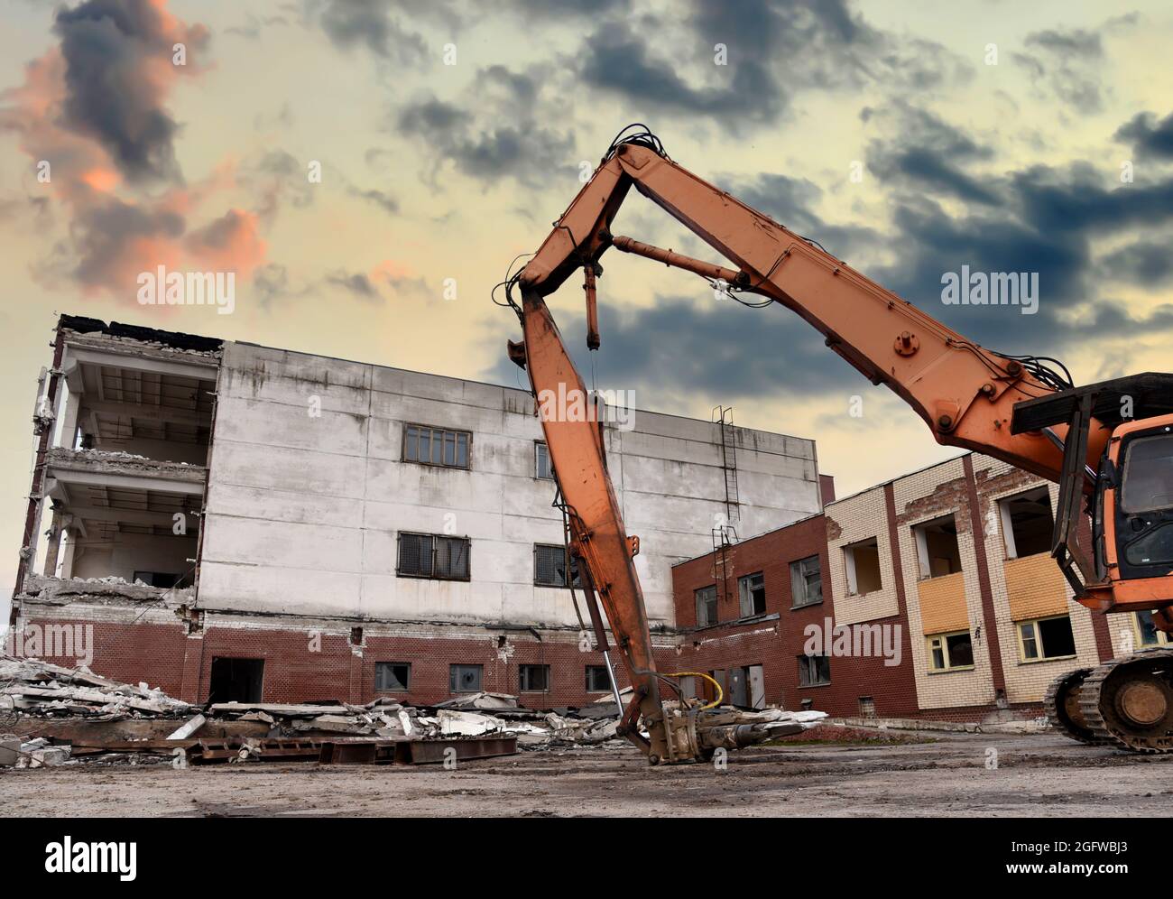 High Reach Excavator machines for demolition of tall building. Machine ...