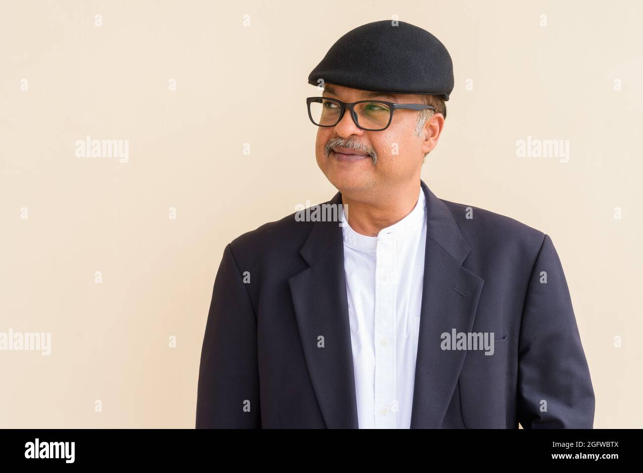 Indian man wearing cap hi-res stock photography and images - Alamy